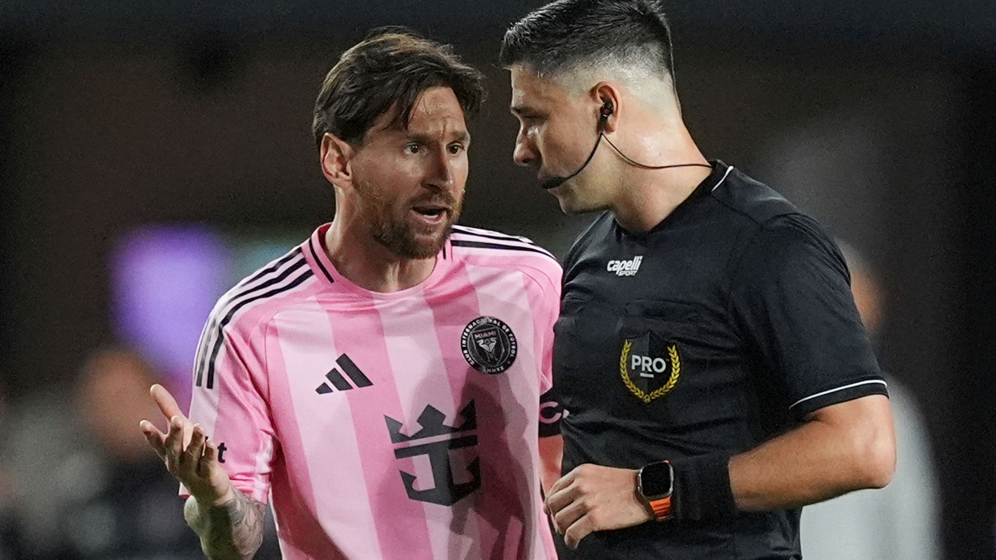 Lionel Messi fined for grabbing neck of New York City assistant coach ...